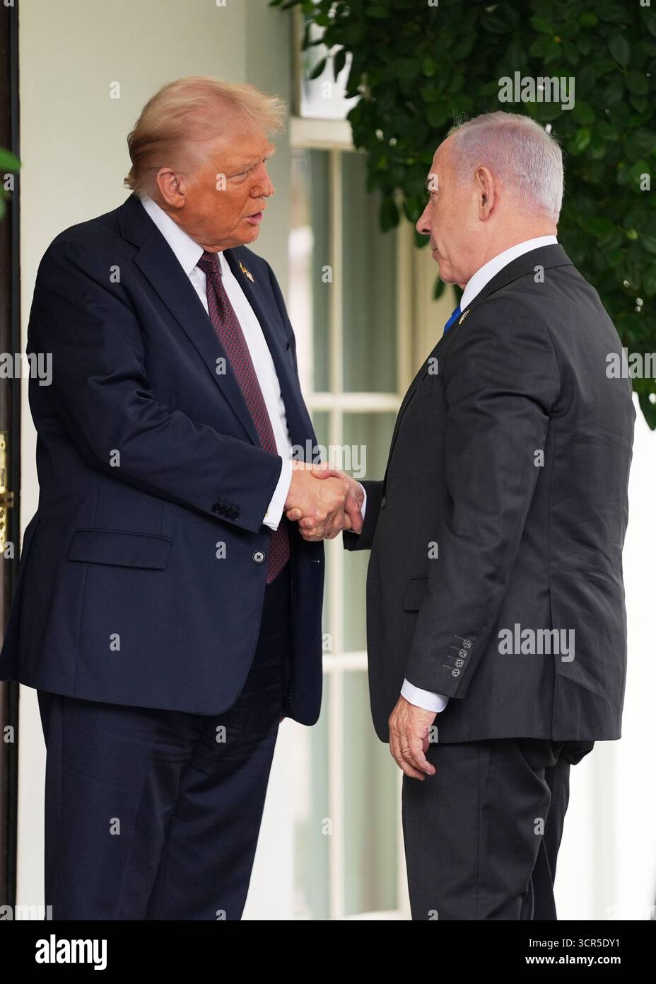 President Donald Trump, left, shake the hand of Israeli Prime Minister ...