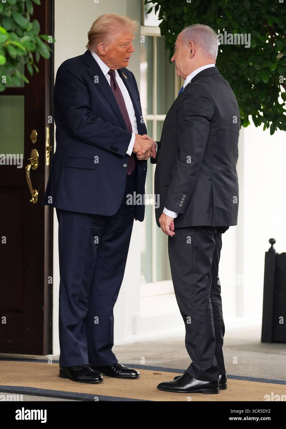 President Donald Trump, left, shake the hand of Israeli Prime Minister ...