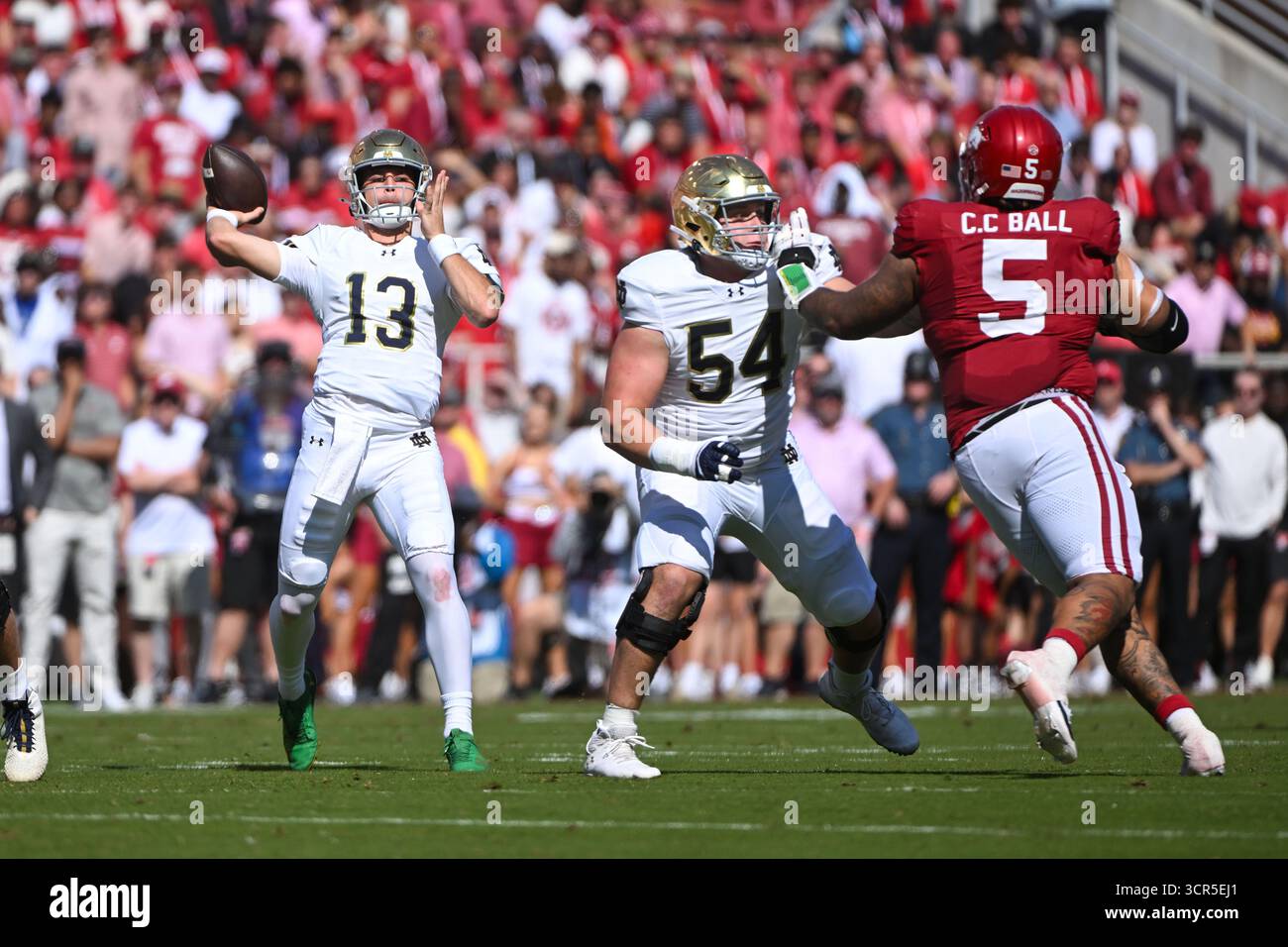 Notre Dame quarterback CJ Carr (13) gets a block from offensive lineman ...