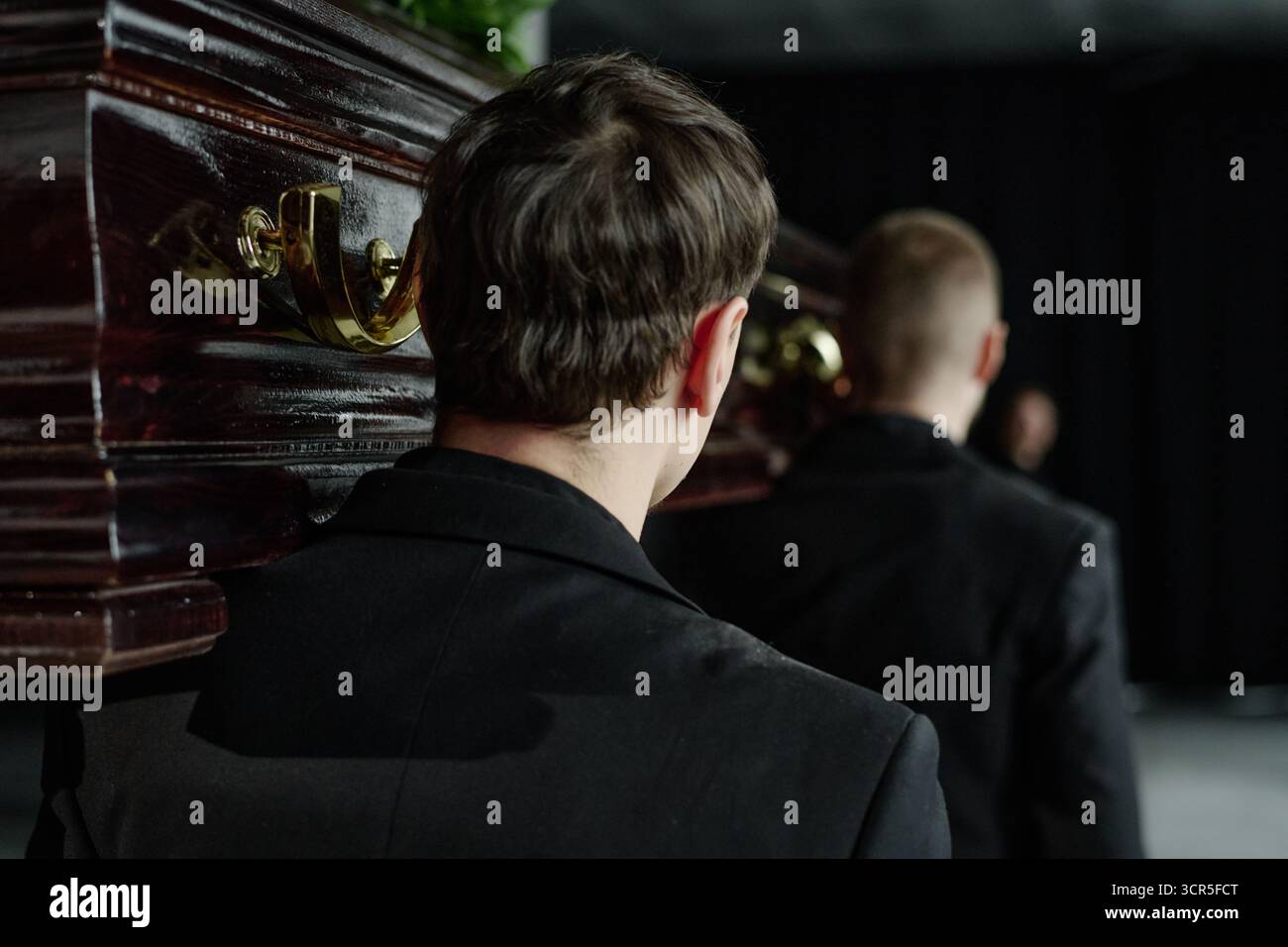 Young Caucasian Men Carrying Coffin during Funeral Ceremony Indoors ...