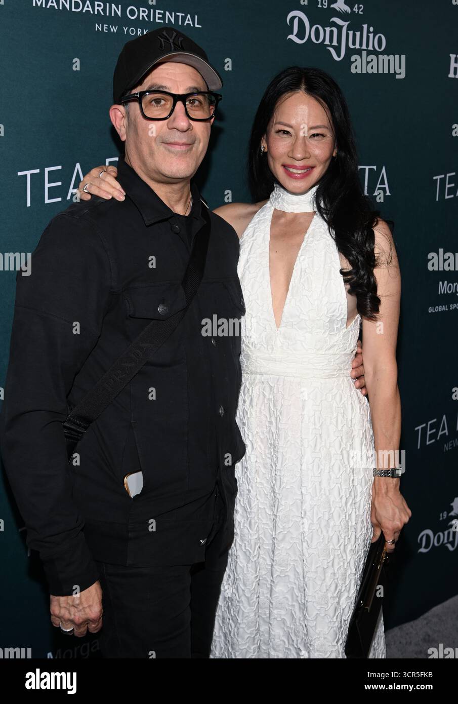 New York City, USA. 28th Sep, 2025. Jason Weinberg (L) and Lucy Liu ...