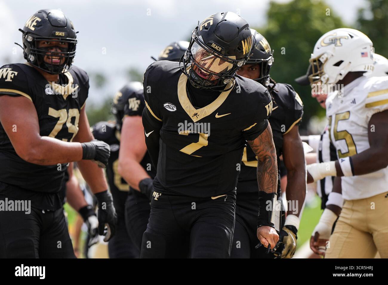 Wake Forest quarterback Robby Ashford (2) reacts after scoring a ...