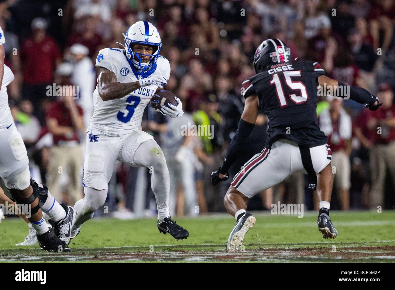 Kentucky running back Seth McGowan (3) runs the ball against South ...