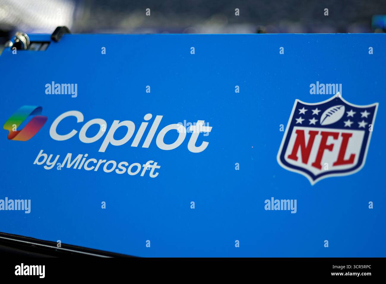 Copilot by Microsoft signage is seen before an NFL football game ...