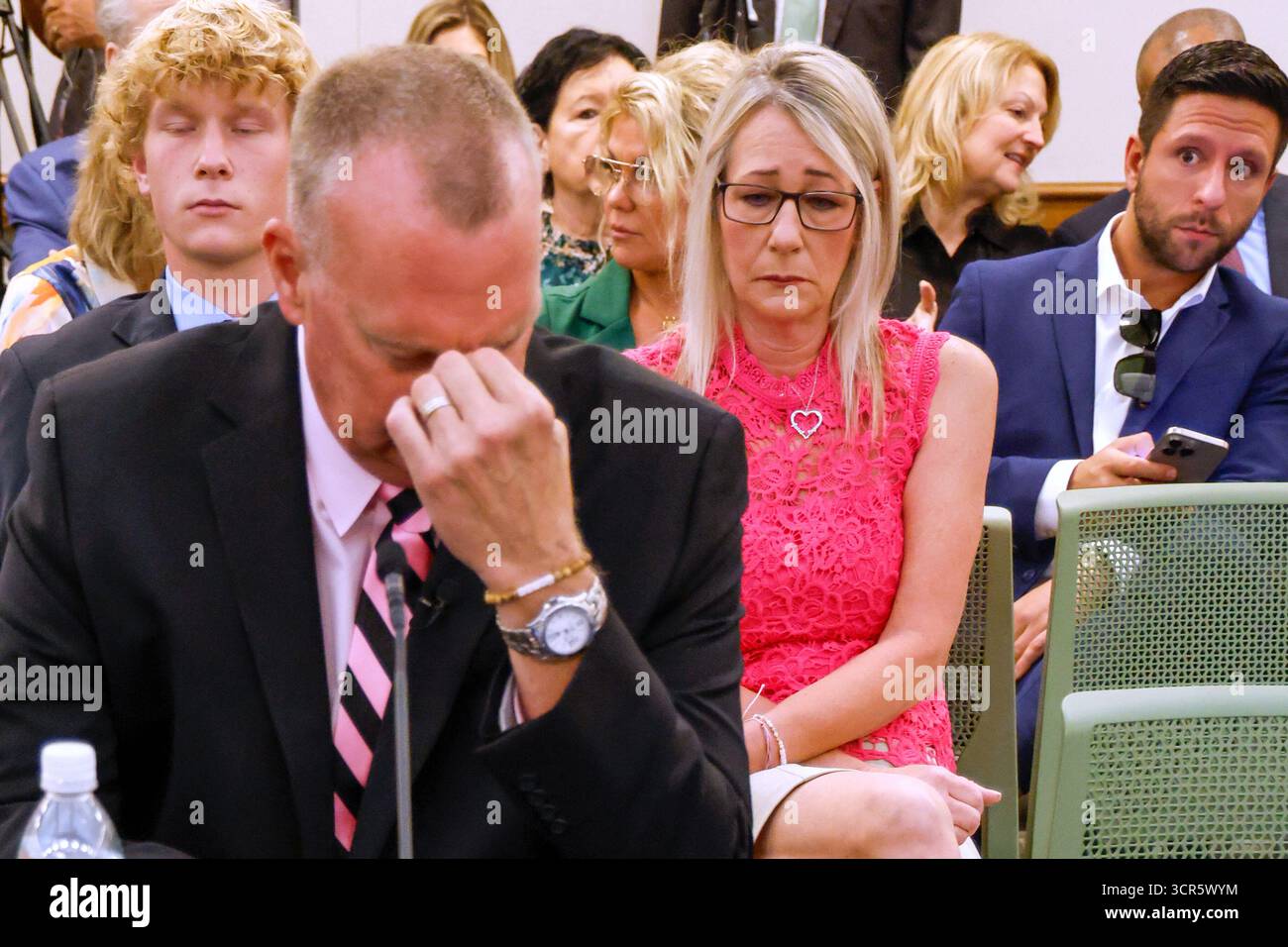 Steve Federico gathers himself as he waits to testify about his ...