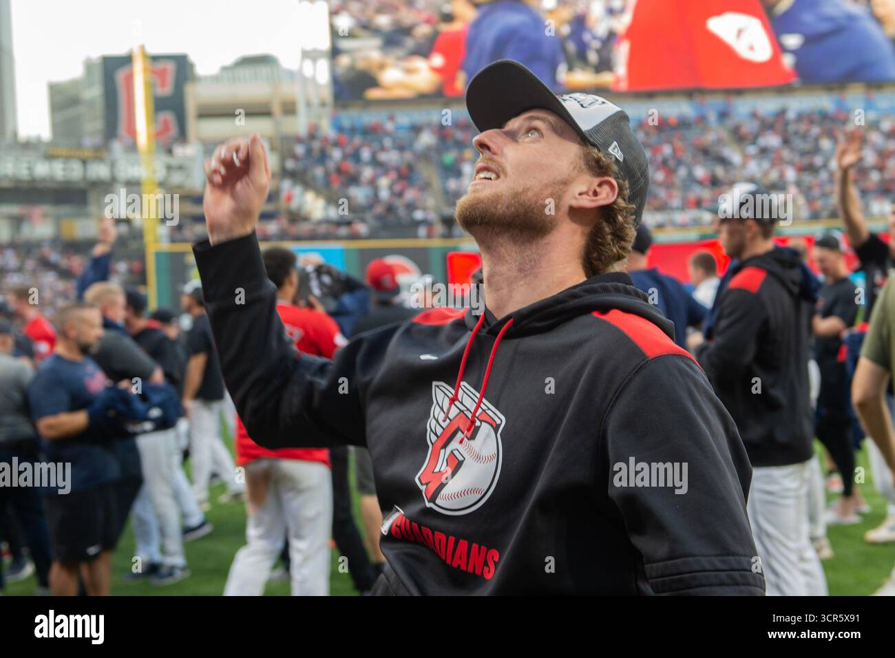 Cleveland Guardians starting pitcher Tanner Bibee looks to the crowd as ...