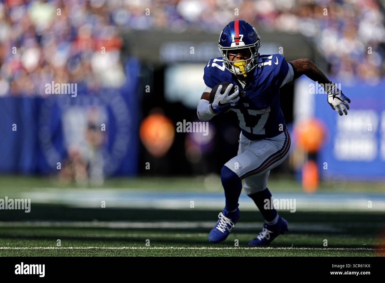 New York Giants wide receiver Wan'Dale Robinson (17) runs with the ball ...