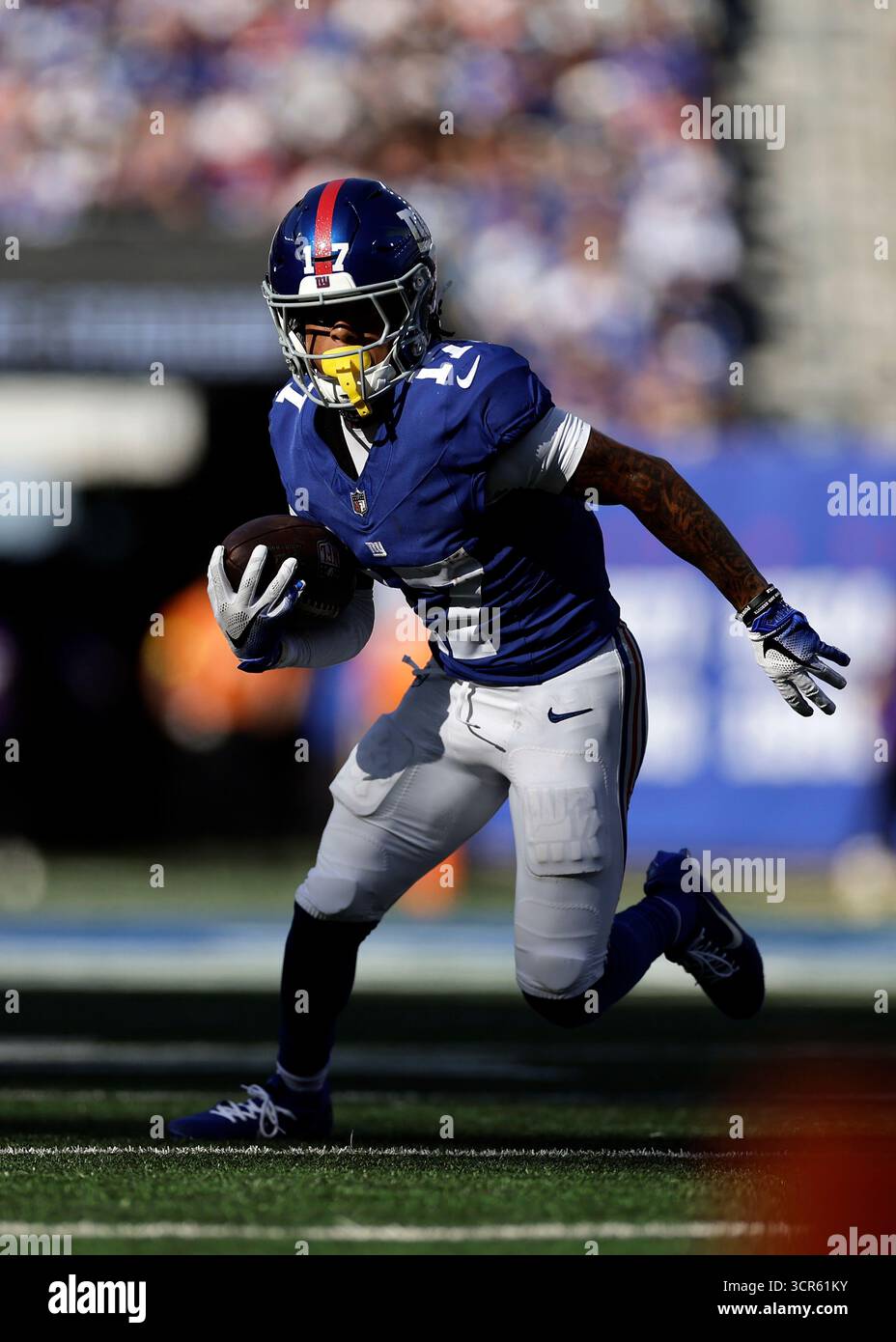 New York Giants wide receiver Wan'Dale Robinson (17) runs with the ball ...