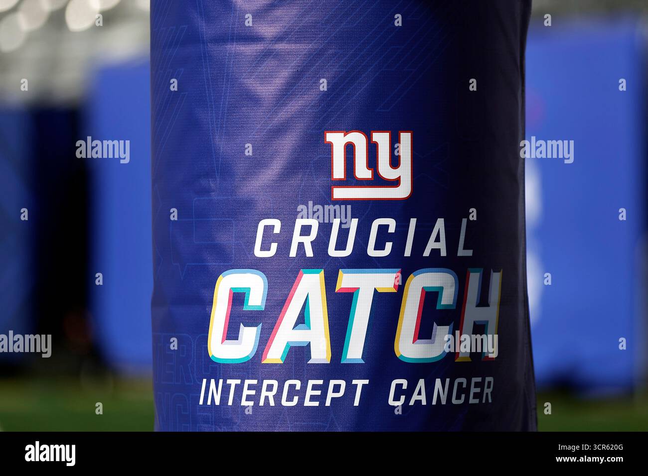 Crucial Catch Intercept Cancer signage is seen before an NFL football ...