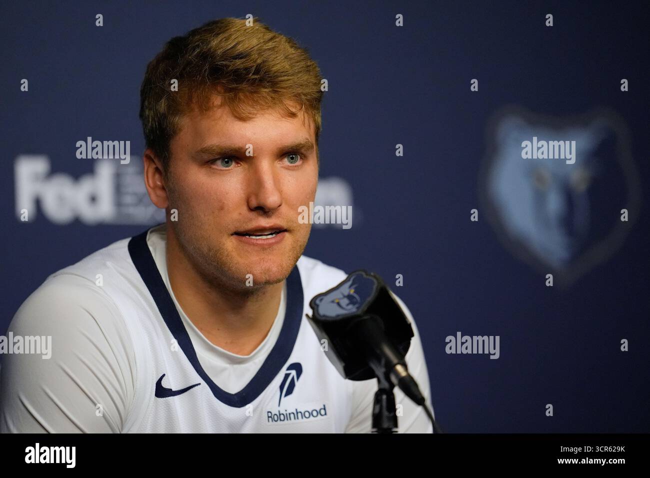 Memphis Grizzlies guard Cam Spencer speaks during a news conference at ...