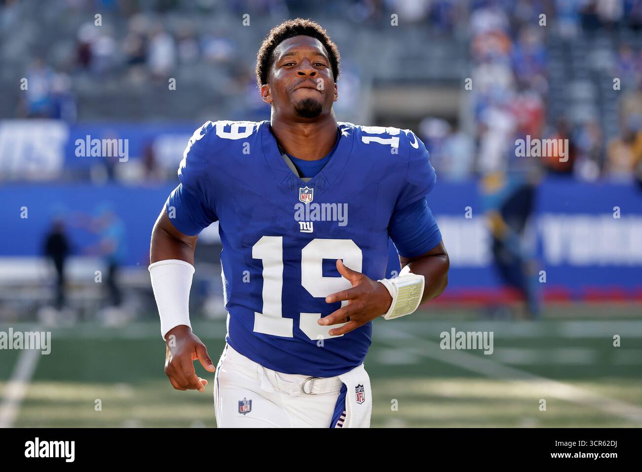 New York Giants quarterback Jameis Winston (19) runs off the field ...