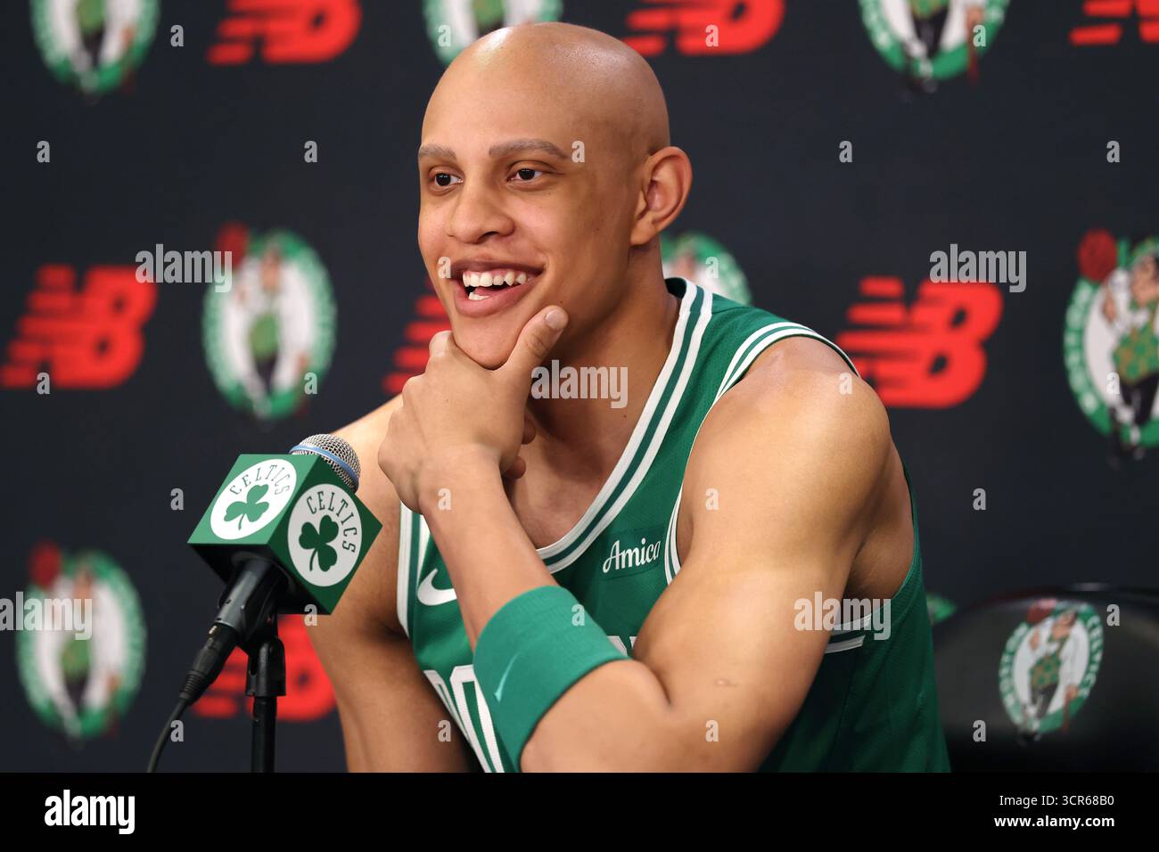 Boston Celtics' Jordan Walsh speaks at a news conference during the NBA ...