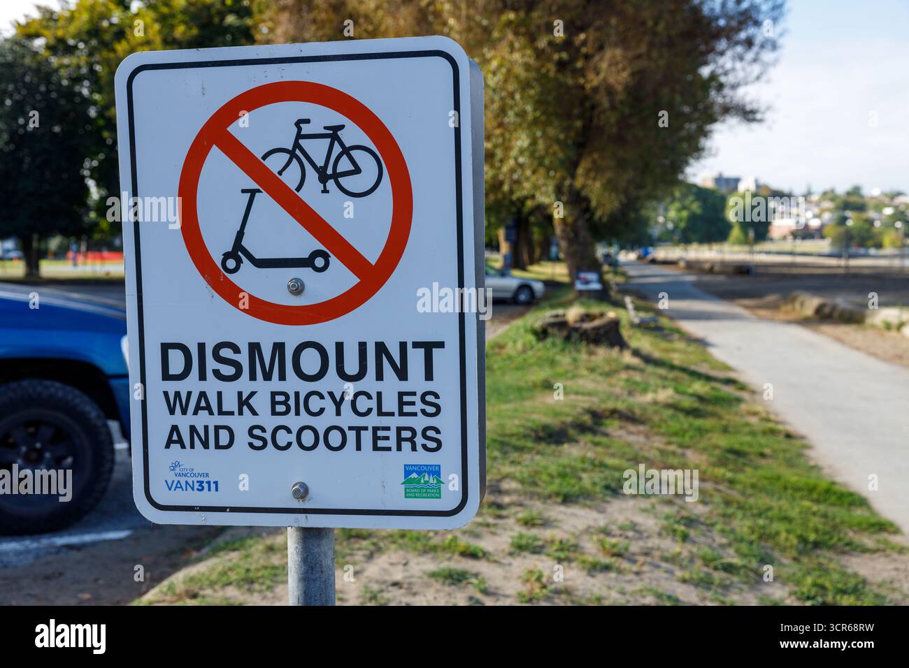 Vancouver, Canada - Sep 15,2025: Sign instructing to dismount and walk ...