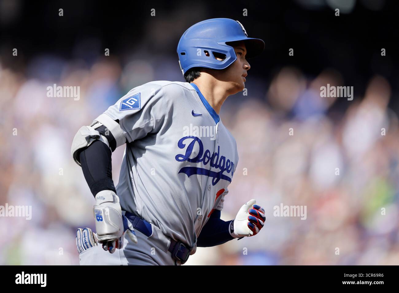 Los Angeles Dodgers' Shohei Ohtani runs the bases on his solo home run ...
