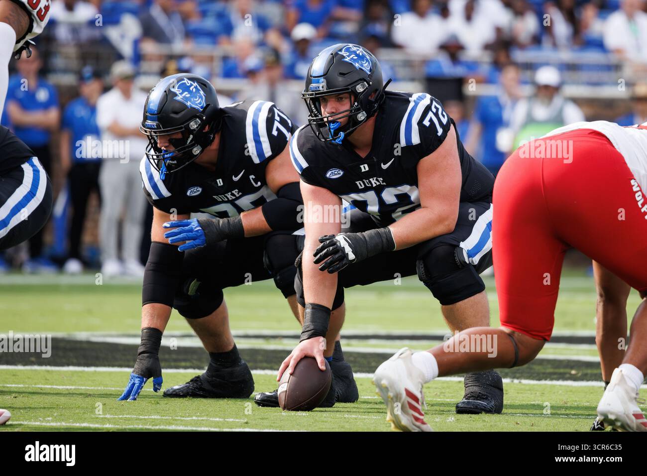 Duke's Matt Craycraft (72) and Justin Pickett (77) line up for a play ...