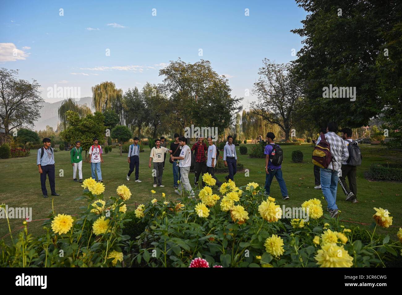 ANANTNAG, INDIA - SEPTEMBER 29: People walk inside the Akad Parkon ...