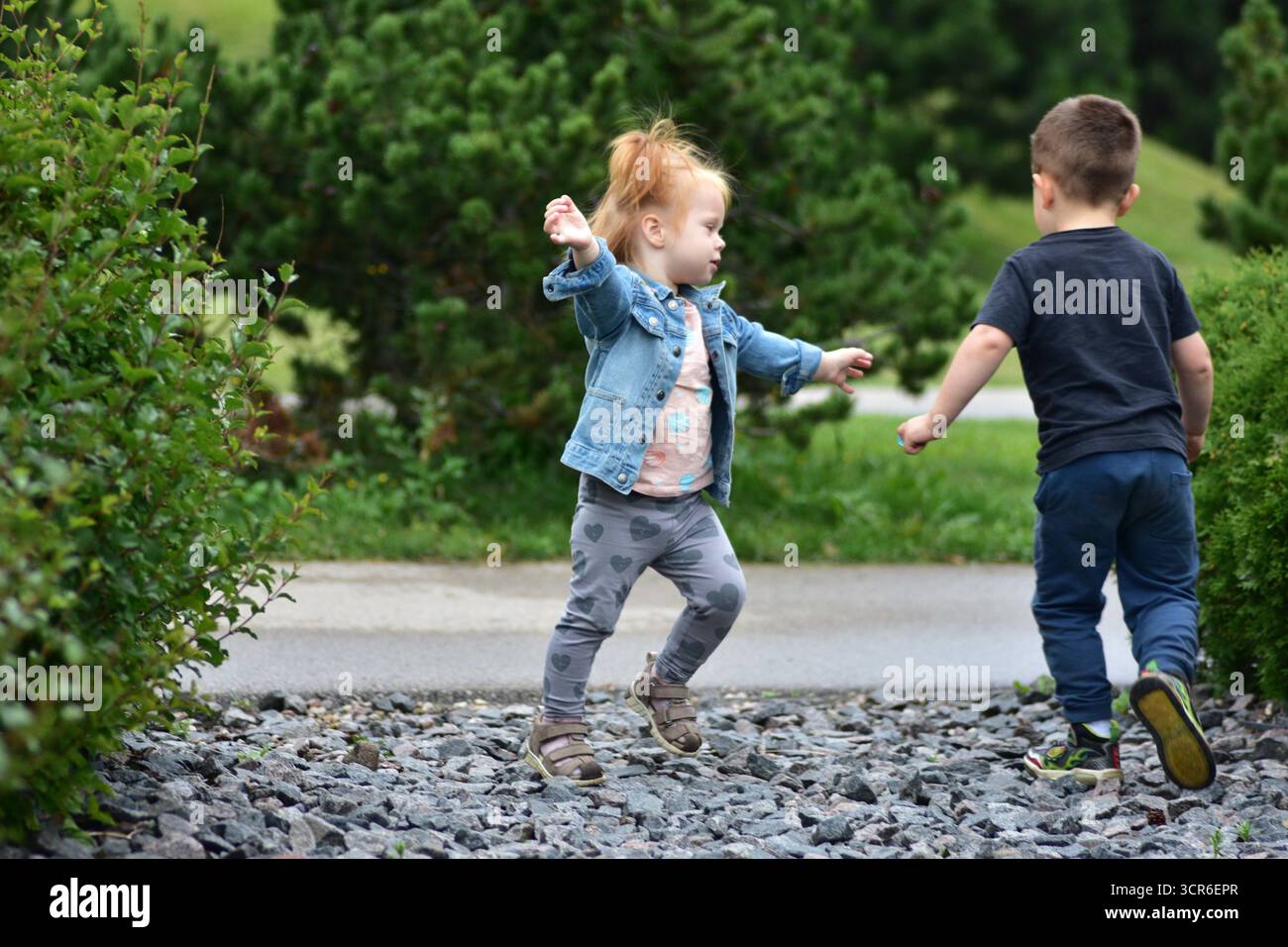 Girl happily running outdoors hi-res stock photography and images - Alamy