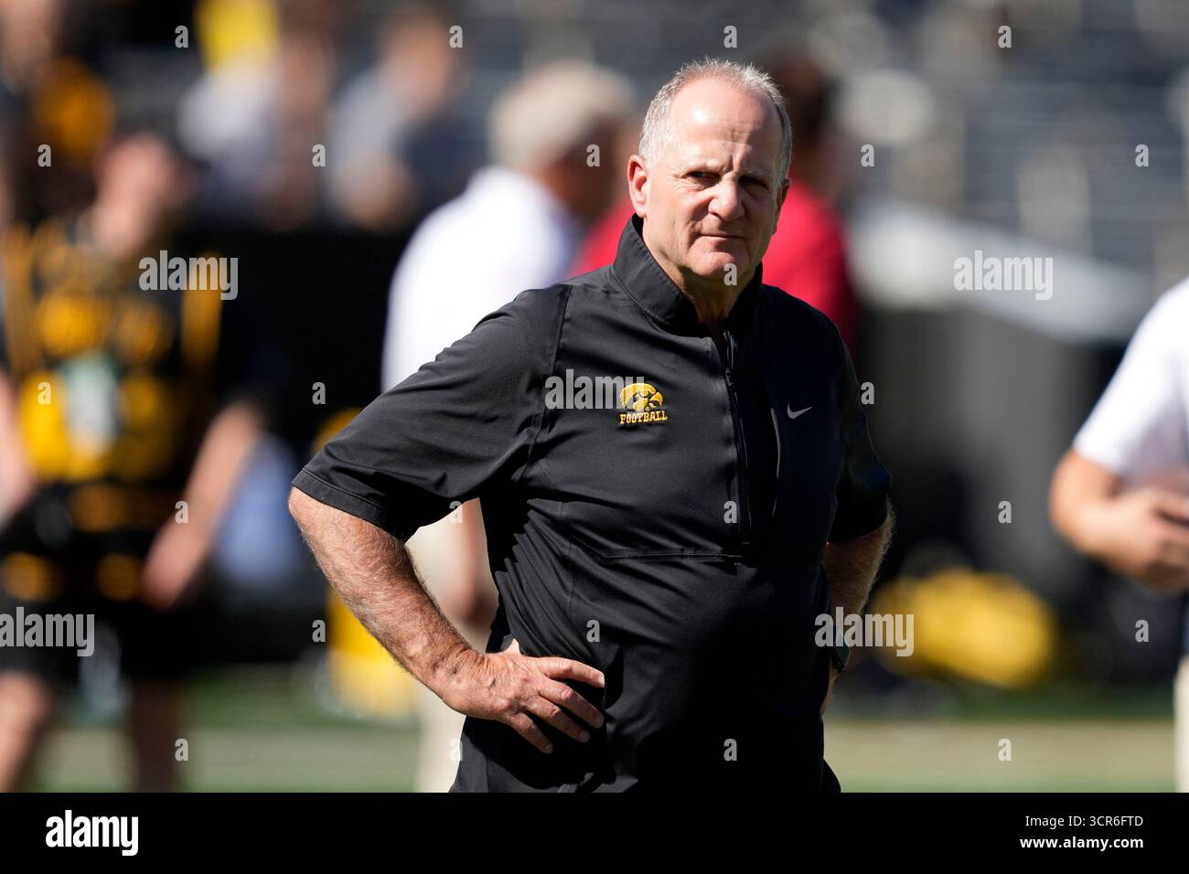 Iowa defensive coordinator Phil Parker stands on the field before an ...