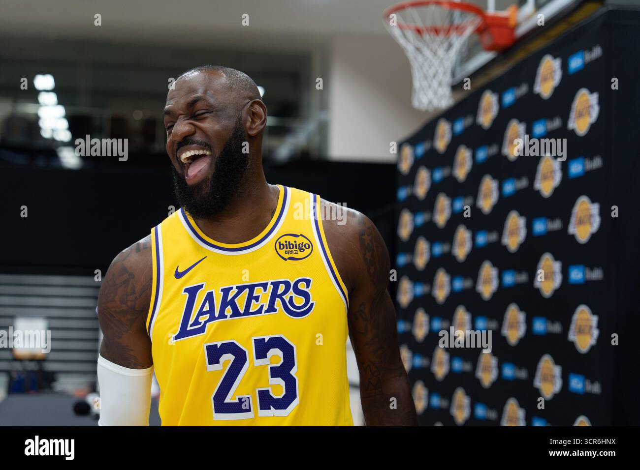 Los Angeles Lakers' LeBron James shares a laugh with a reporter during ...
