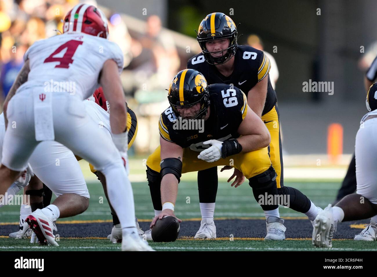 Iowa quarterback Hank Brown (9) gets set for a play during the second ...