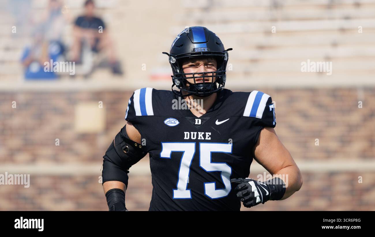 Duke's Bruno Fina (44) runs onto the field prior to an NCAA football ...