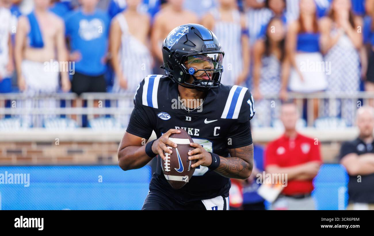 Duke's Darian Mensah (10) looks to throw during an NCAA football game ...