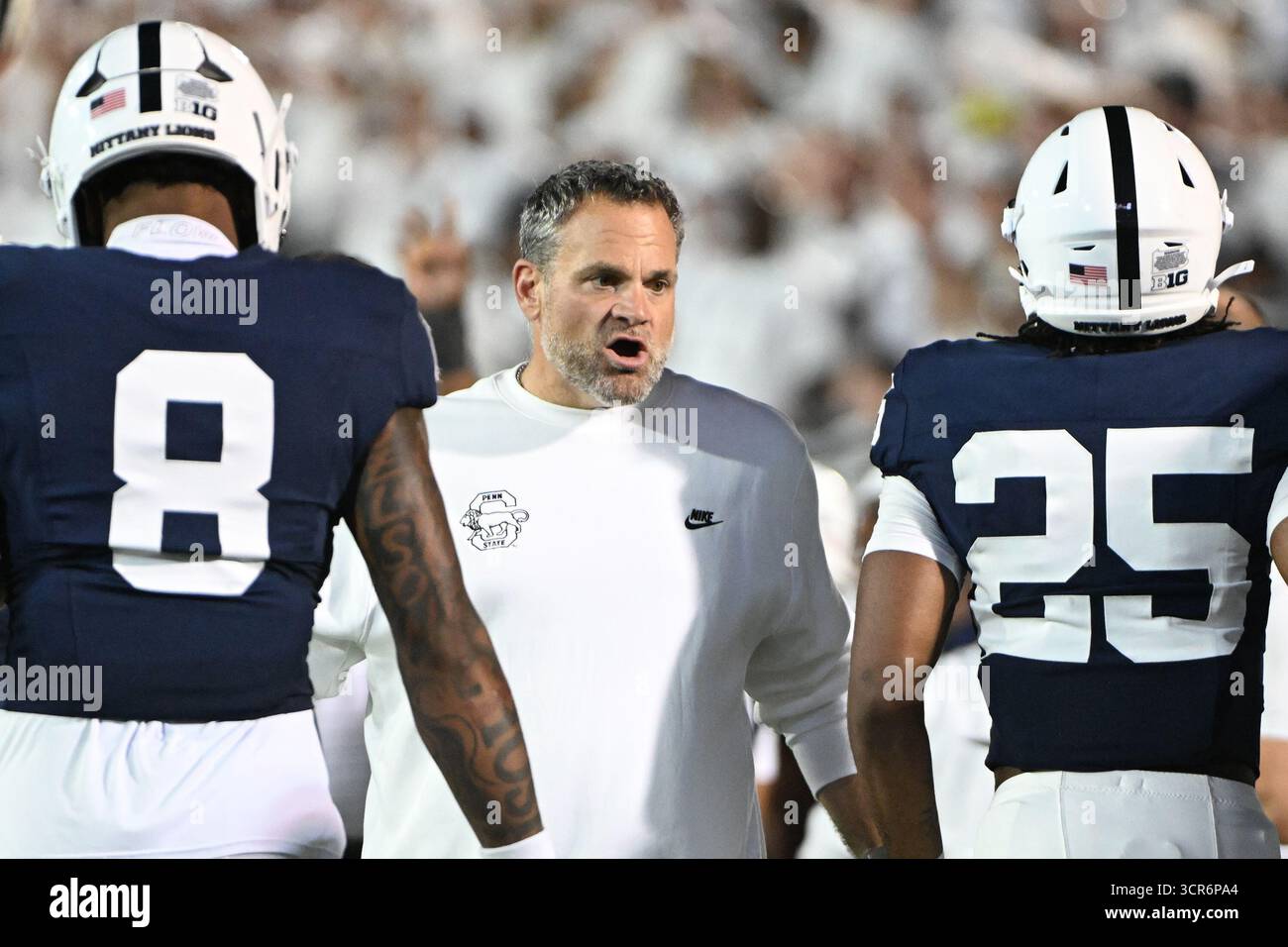 Penn State Athletic Director Pat Kraft greets players during the second ...