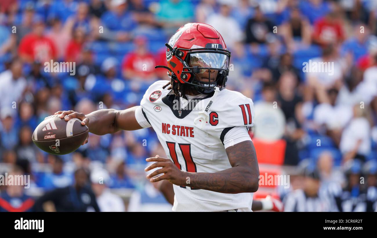 North Carolina State's CJ Bailey (11) throws during an NCAA football ...