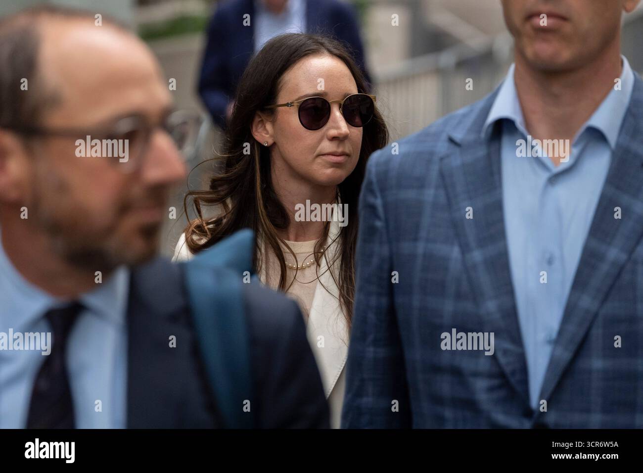 Charlie Javice, center, exits Manhattan federal court, Monday, Sept. 29 ...