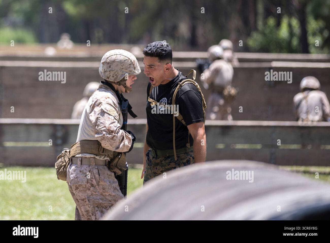 FILE - A U.S. Marine Corps tactical advisors trains a group of recruits ...