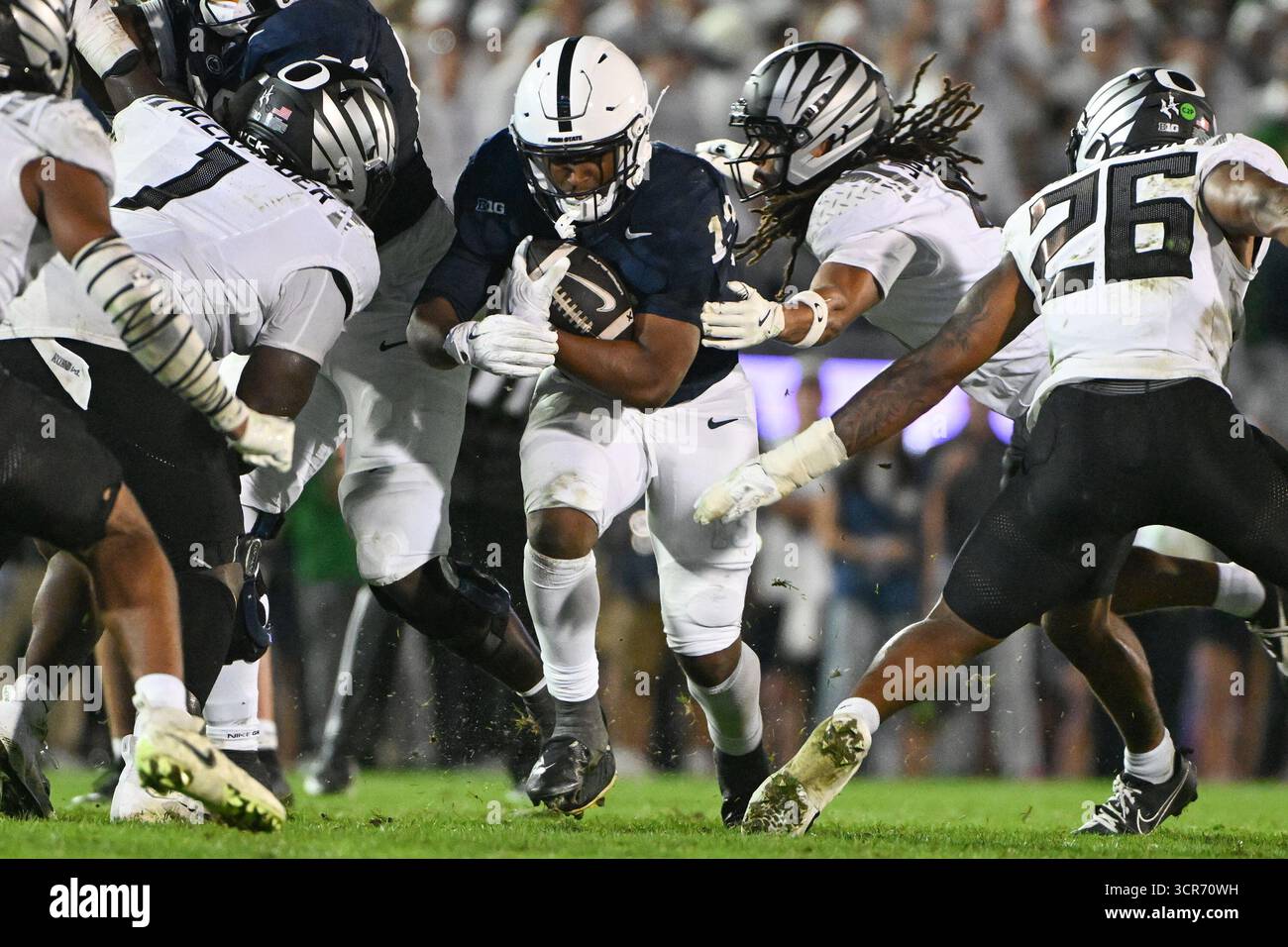 Penn State running back Kaytron Allen (13) looks to elude Oregon ...