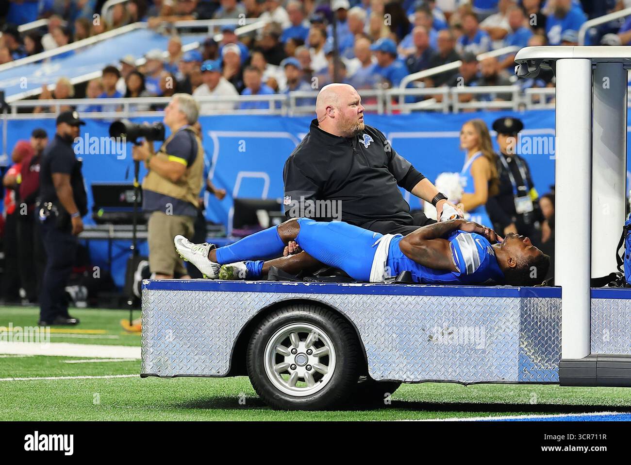 Detroit Lions cornerback DJ. Reed (4) is helped off the field during ...