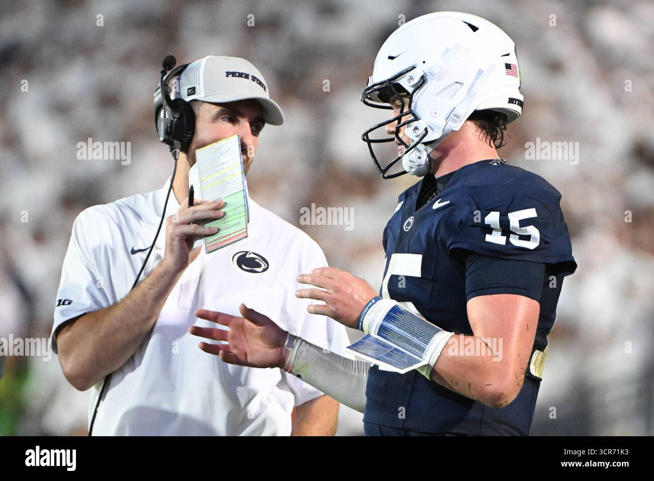 Penn State Quarterbacks Coach Danny O'Brien talks with quarterback Drew ...