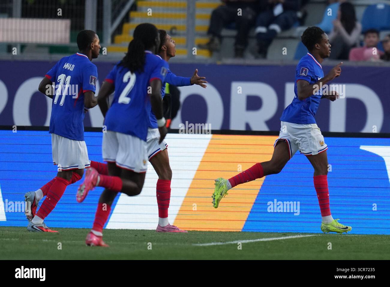 France's Lucas Michal, right, celebrates after scoring his side's ...