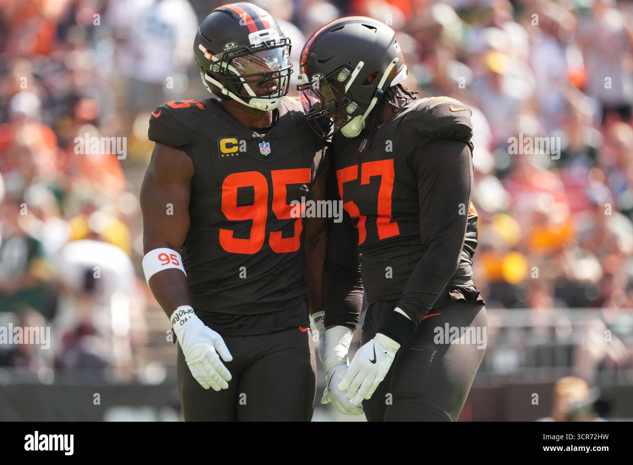 Cleveland Browns defensive end Myles Garrett (95), left, and defensive ...