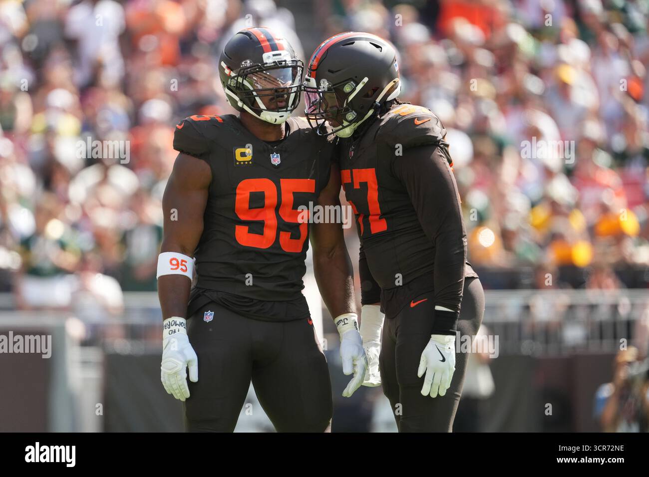 Cleveland Browns defensive end Myles Garrett (95), left, and defensive ...