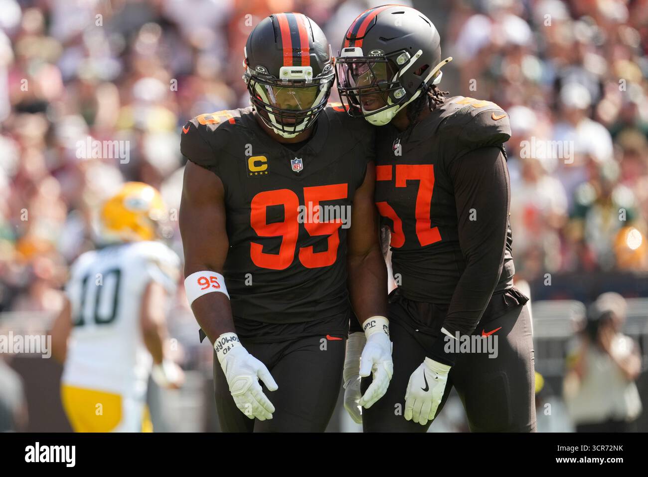 Cleveland Browns defensive end Myles Garrett (95), left, and defensive ...