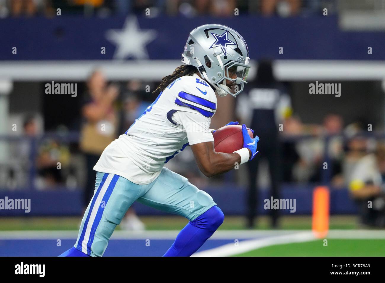 Dallas Cowboys kick returner Kavontae Turpin fields a kickoff during an ...