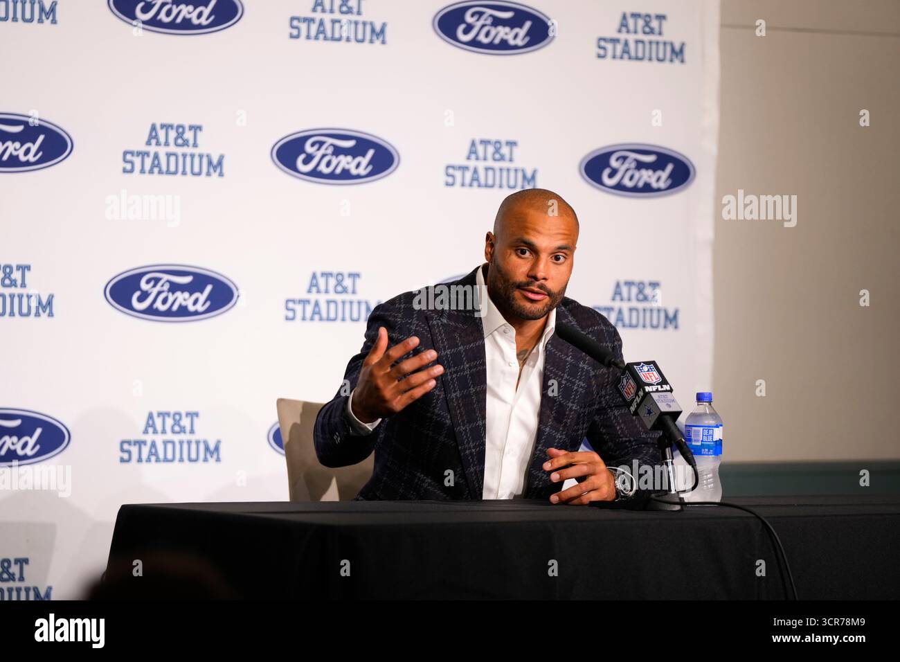 Dallas Cowboys quarterback Dak Prescott talks to the media during a ...