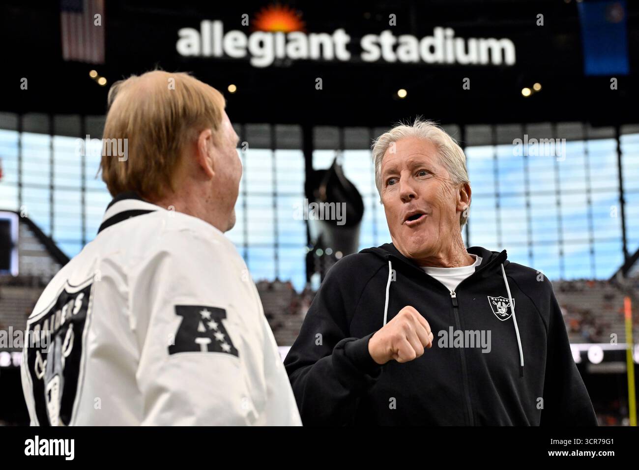 Las Vegas Raiders owner Mark Davis, left, and head coach Pete Carroll ...