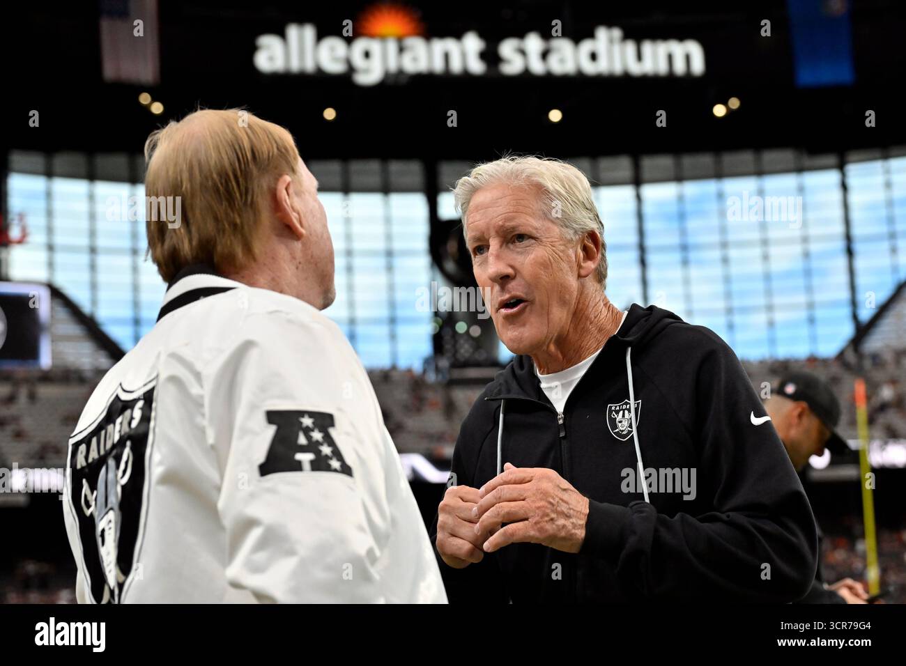 Las Vegas Raiders owner Mark Davis, left, and head coach Pete Carroll ...