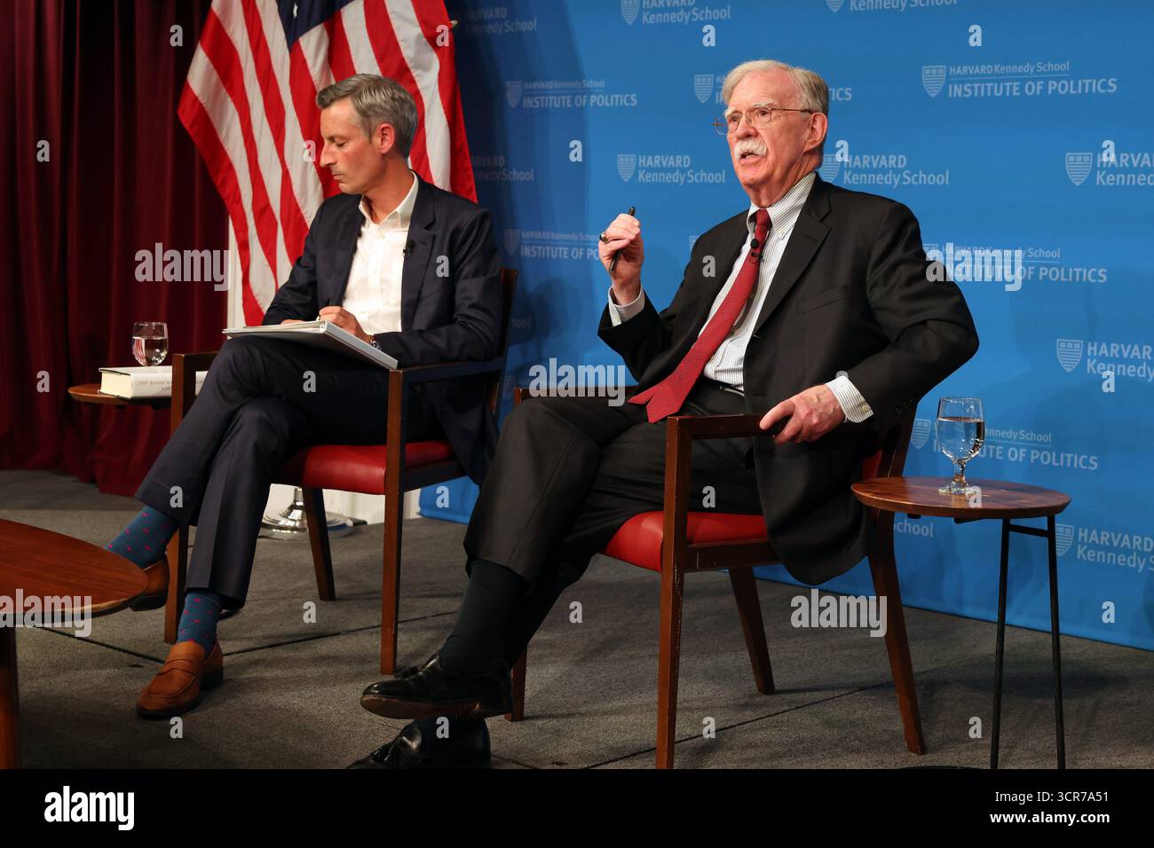 John Bolton, right, speaks beside moderator Professor Jeff Frankel ...