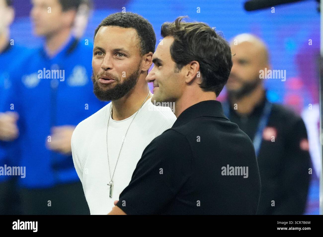 Golden State Warriors basketball player Stephen Curry, left, talks with ...