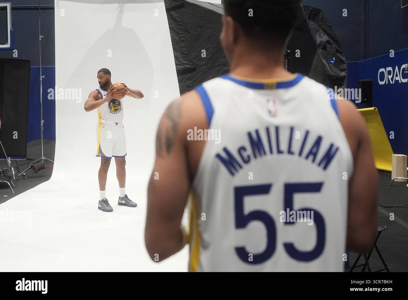 Golden State Warriors' Chance McMillian (55) watches as Marques Bolden ...