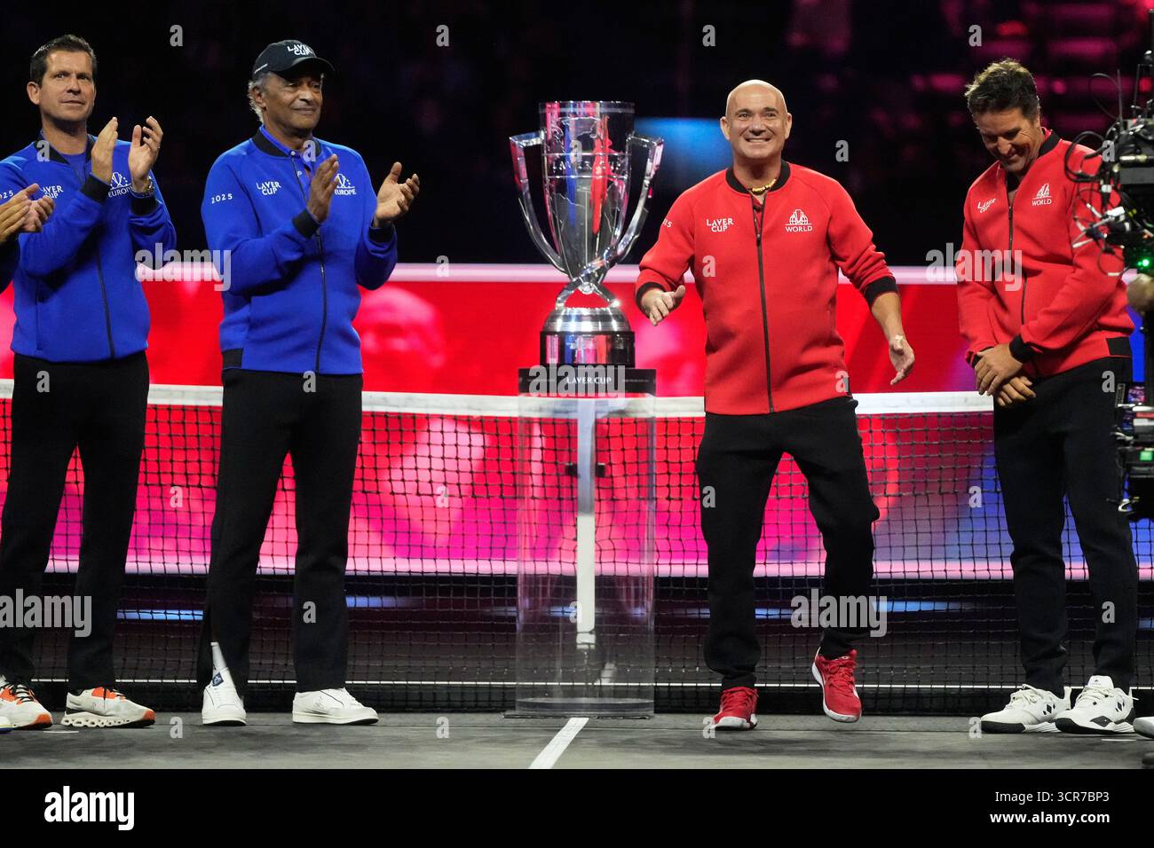 Team Europe captain Yannick Noah, left, and Team World captain Andre ...