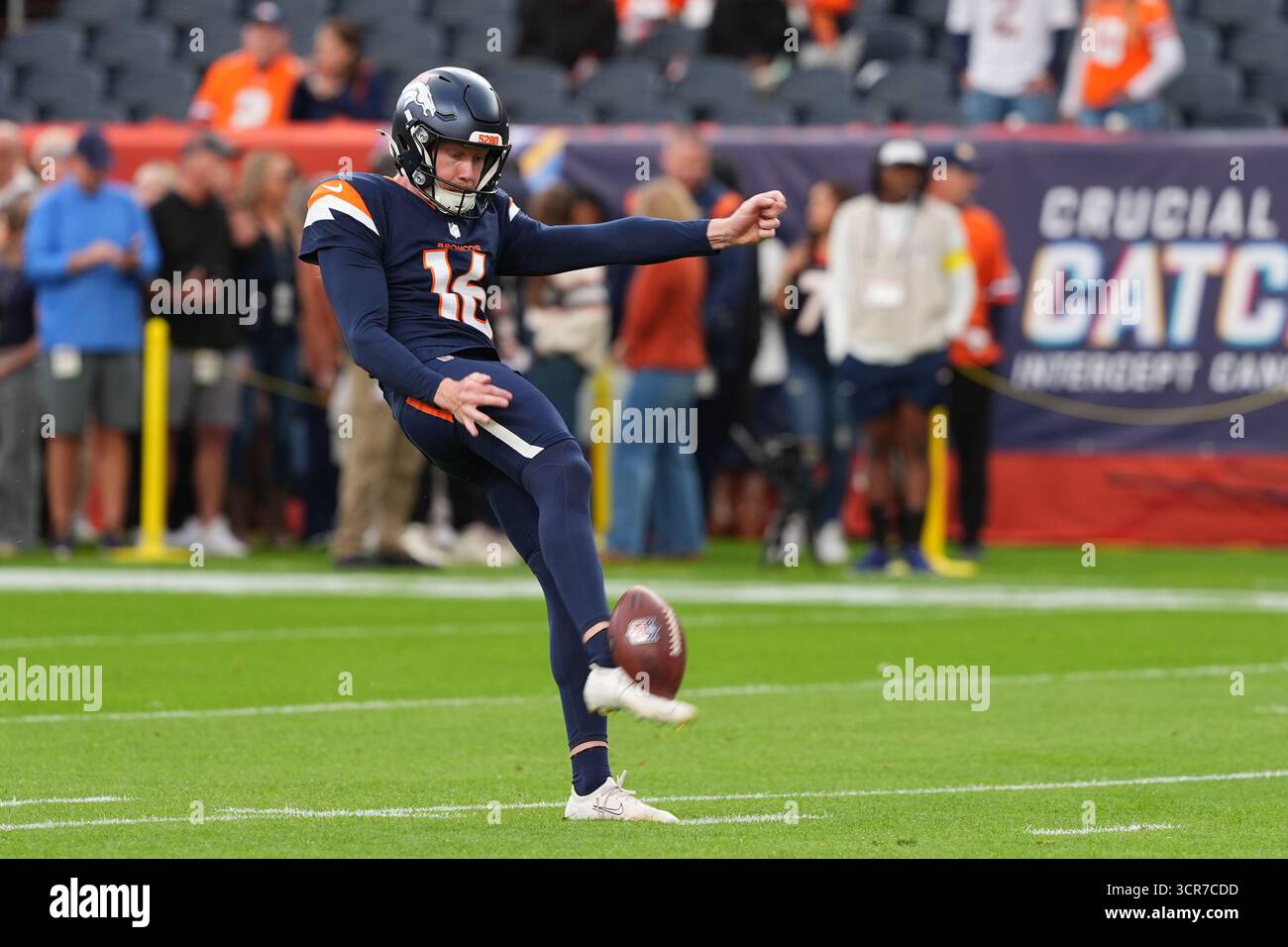 Denver Broncos punter Jeremy Crawshaw (16) warms up before an NFL ...