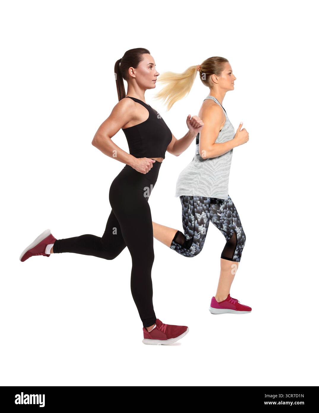 Running sporty women on Cut Out Stock Images & Pictures - Alamy