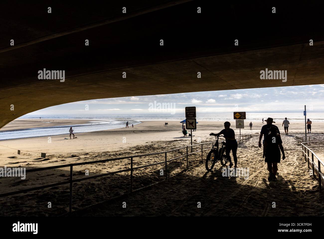 Beach goers take advantage of a beautiful fall late afternoon along ...