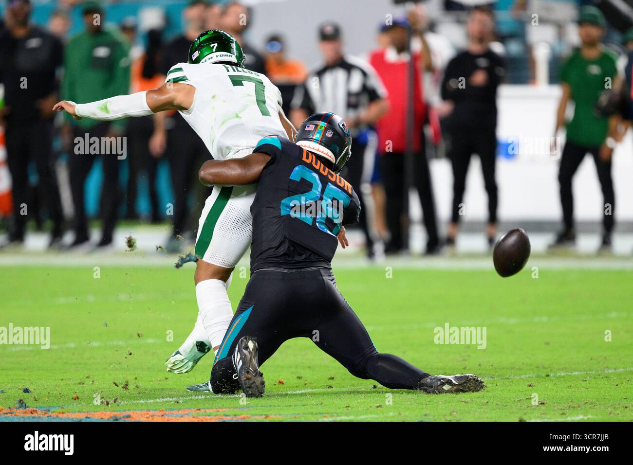 Miami Dolphins linebacker Tyrel Dodson (25) forces New York Jets ...