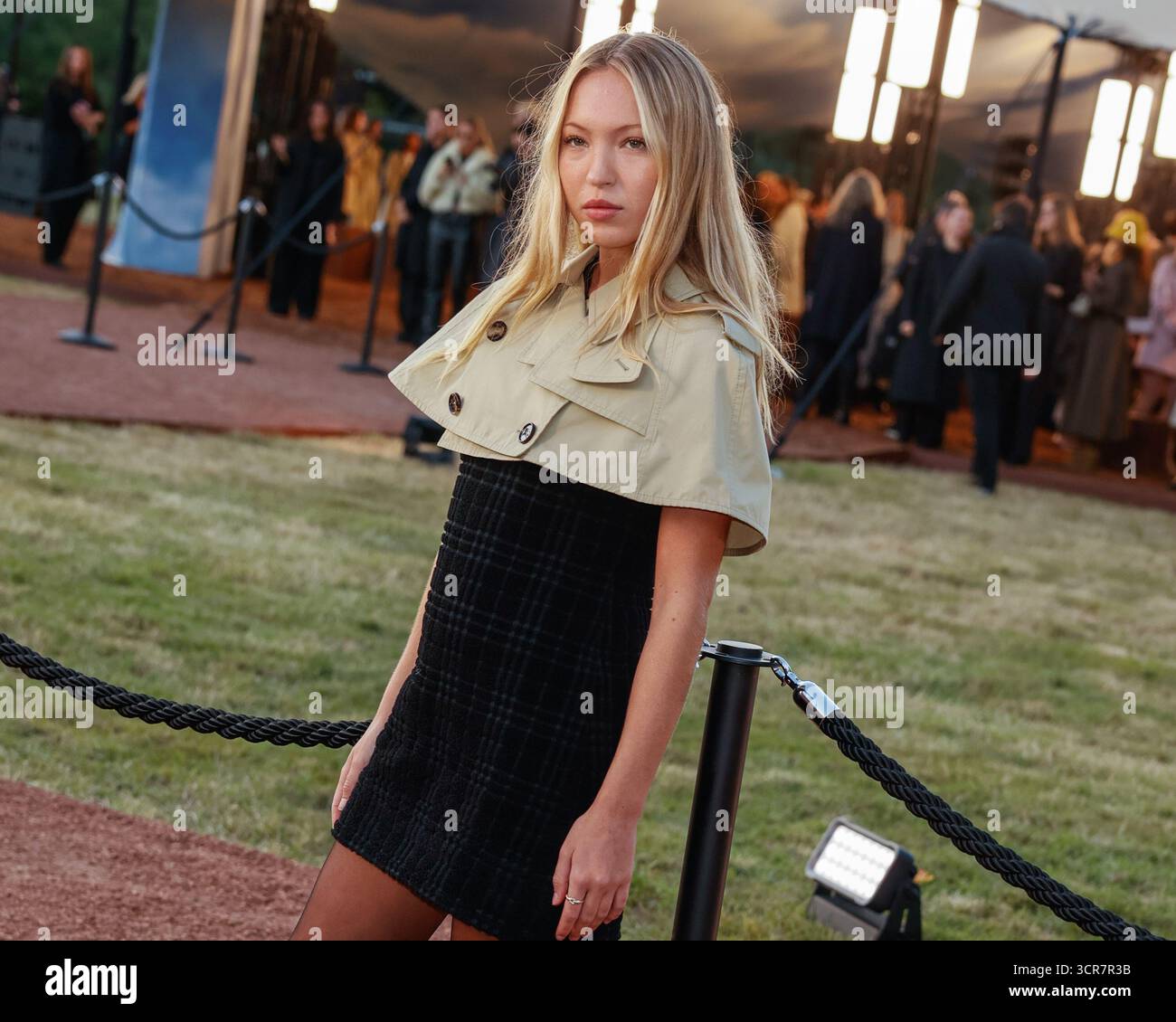 Lila Moss attends the Burberry Summer 2026 Show held at the Perks Field, Orme Square Stock Photo ...